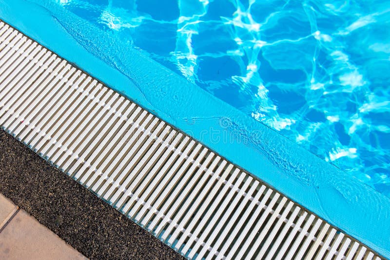 The Edge of a Swimming Pool with Blue Water As an Abstract Background ...