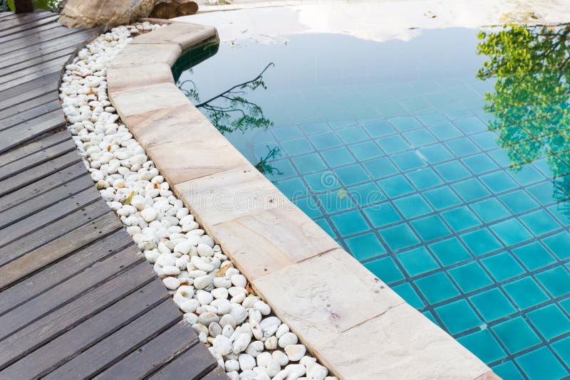 Stone on the Edge of the Swimming Pool Stock Image - Image of tiles ...