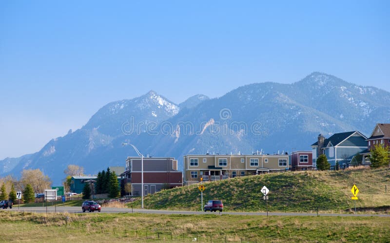 Edge of Town with Blue Mountains in the Distance Stock Photo - Image of ...