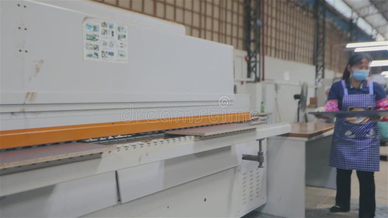 Edgebander Machine. People Work on Edgebanding Machine. Single Sided ...