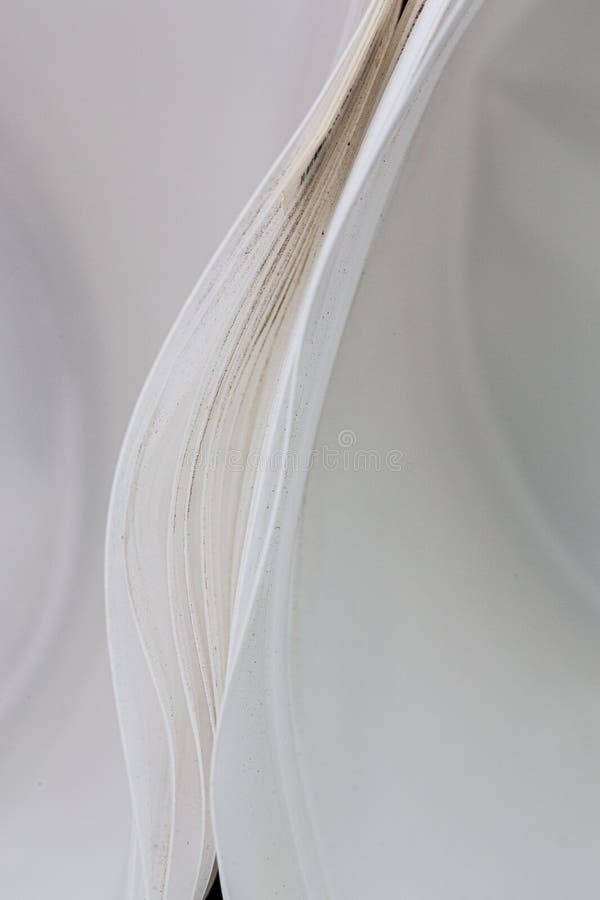 The Edges of Soft, Stacked Plastic Containers Form a Sweeping Open Lip ...