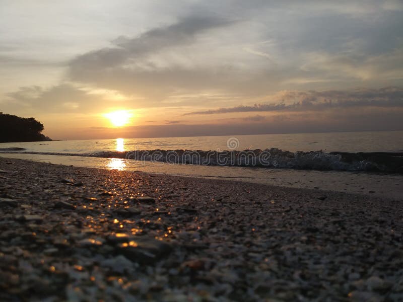 A Edgewater Sunset stock photo. Image of beach, clouds - 153855830