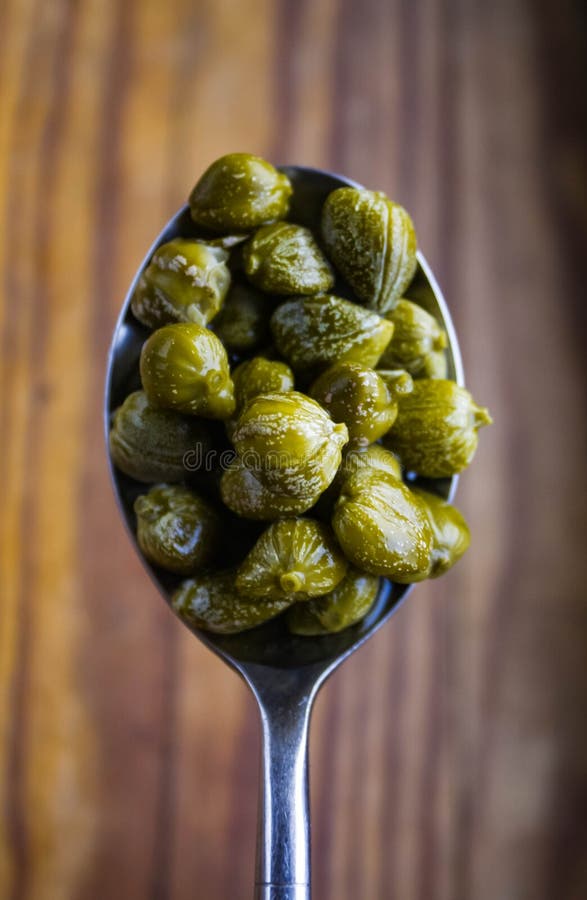 Edible Capers in Spoon Ready To Eat. Stock Photo - Image of closeup ...