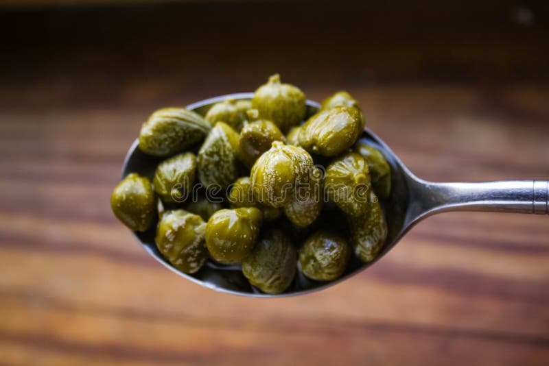Edible Capers in Spoon Ready To Eat. Stock Image - Image of capparis ...