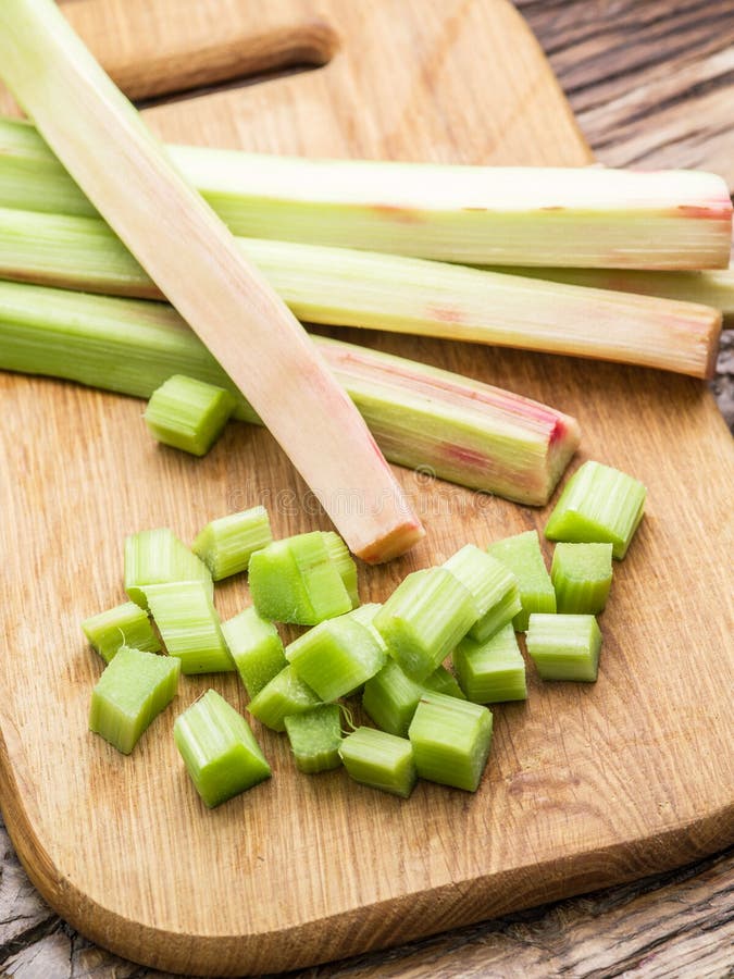 Edible rhubarb stalks. stock image. Image of healthy - 85421379