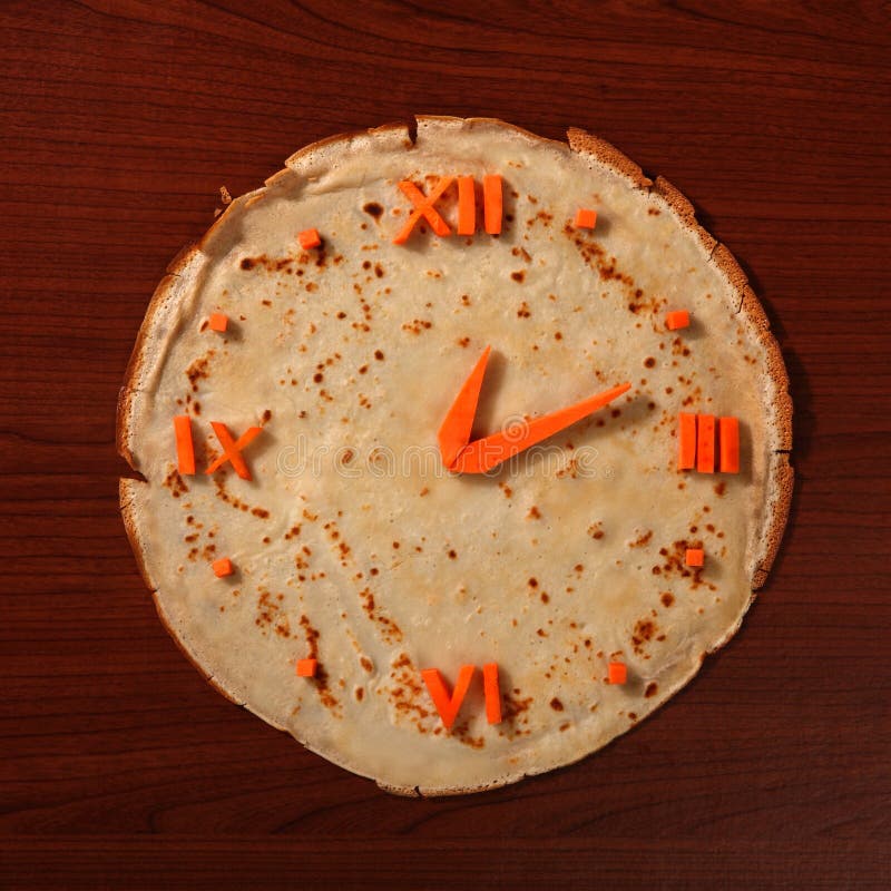 Edible Watch from Carrot and Pancake on Wooden Background Stock Image ...