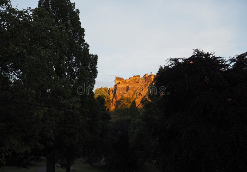Edinburgh castle at sunset stock image. Image of kingdom - 122045441