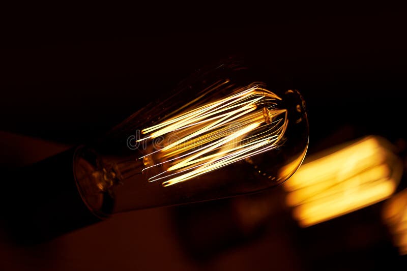 Edison Light Bulb Hanging on a Long Wire. Cozy Warm Yellow Light.Retro ...