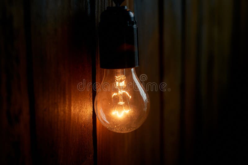Edison Light Bulb Hanging on a Long Wire. Cozy Warm Yellow Light.Retro ...
