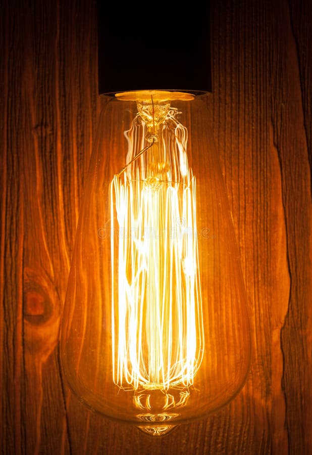 Edison Light Bulb on Wooden Background Stock Photo - Image of glass ...
