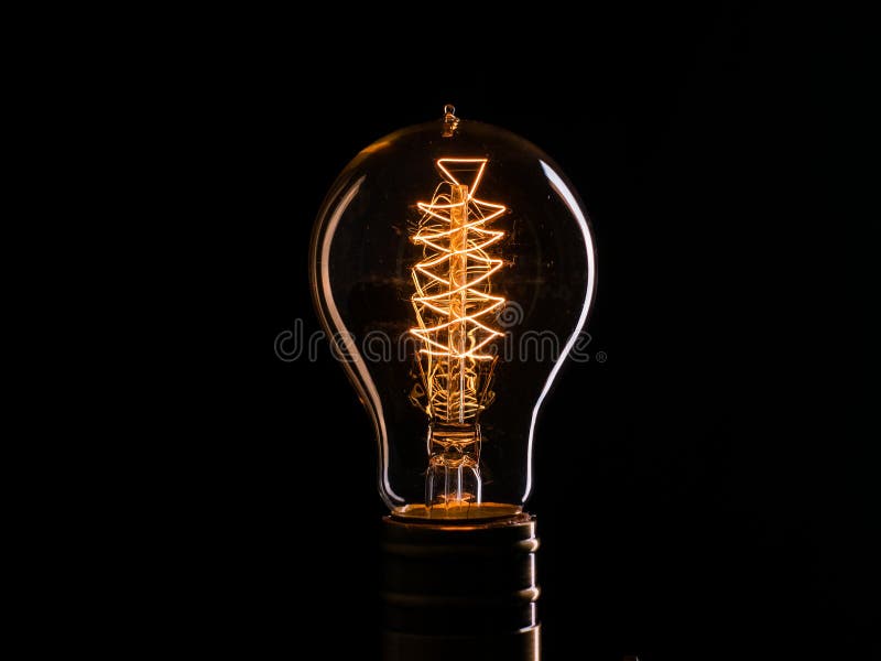 Edison`s Light Bulb Illuminates from Electric Current Stock Photo ...