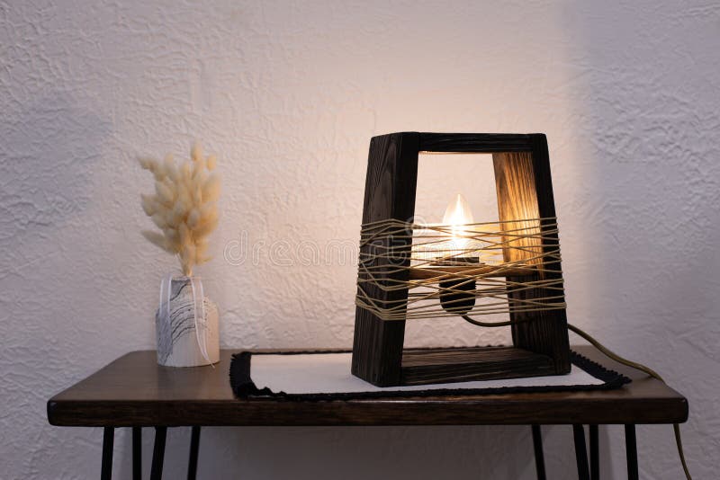 Edison Table Lamp on the Table. a Stylish Wooden Lamp in a Loft Style ...