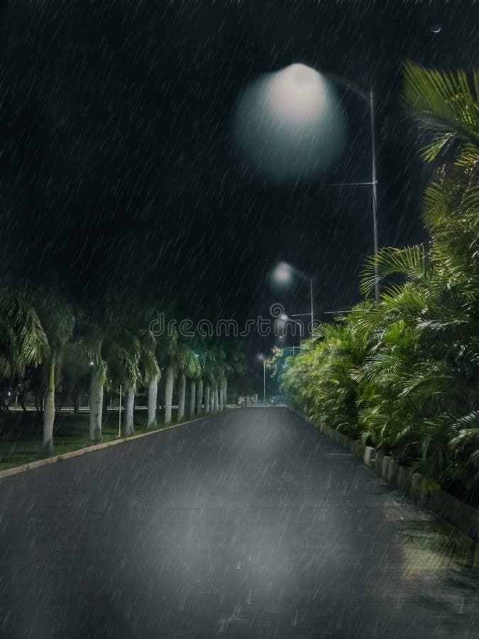 Street on a rainy night stock image. Image of dark, road - 190866369