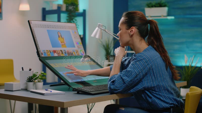 Editing Artist Doing Retouch Work on Pictures Using Touch Screen Stock ...