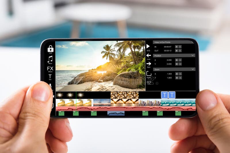 Editing Videos on Mobile Phone Stock Photo - Image of posting, male ...