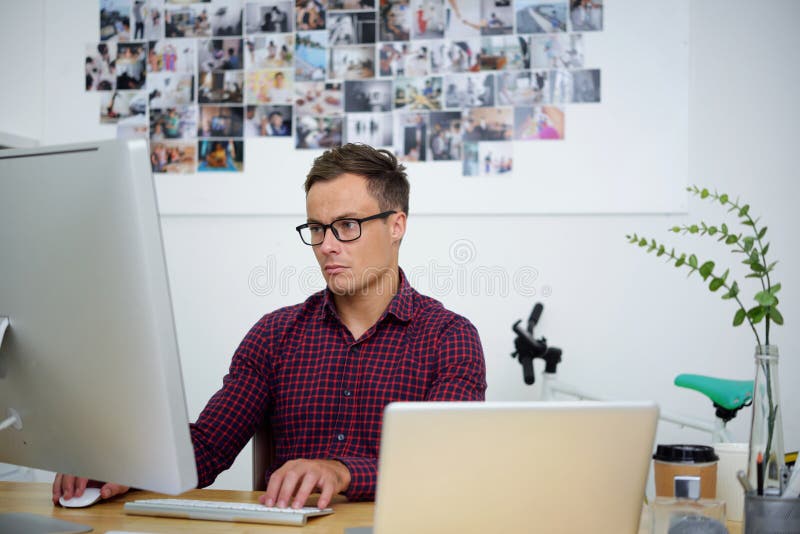 Editor at his computer stock image. Image of busy, serious - 124920569