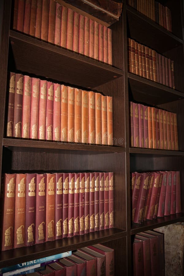 Editorial Bound Books of Punch Magazine Lined Up on Shelves of Library ...