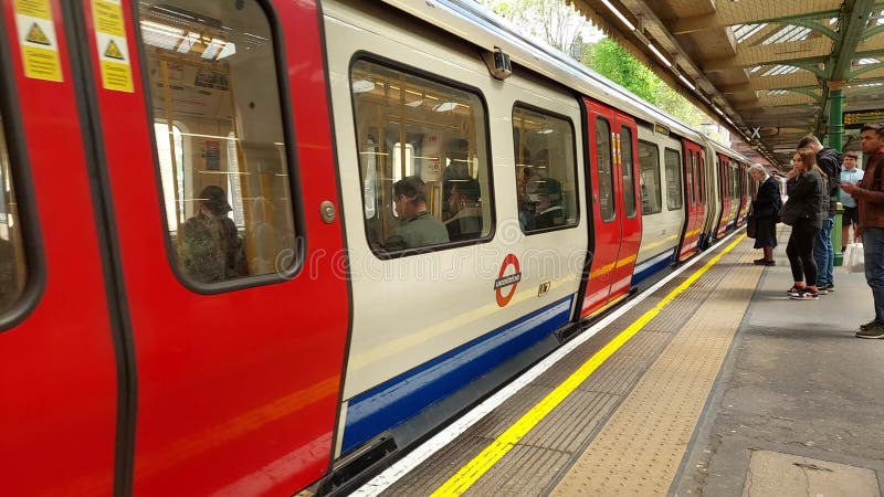 London Public Underground Train Arrive at a Station Stock Video - Video ...