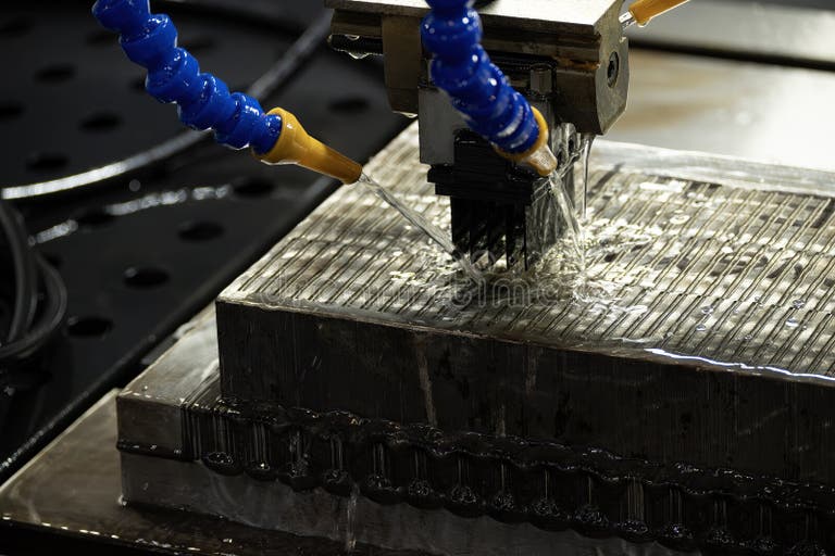 The EDM Machine Working with Graphite Electrode by Liquid Coolant ...