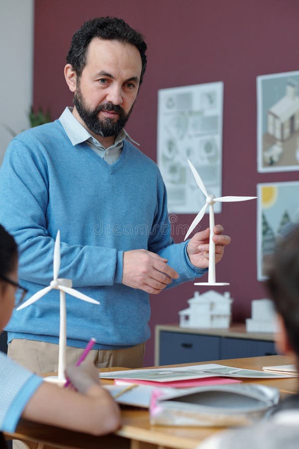Educating Students on Renewable Energy Models in Classroom Stock Photo ...