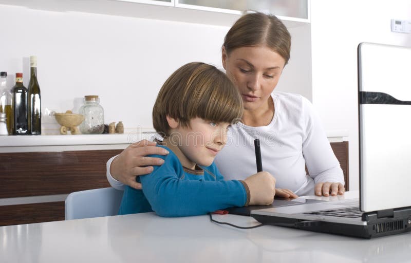 Home schooling with laptop stock image. Image of carpet - 6406755