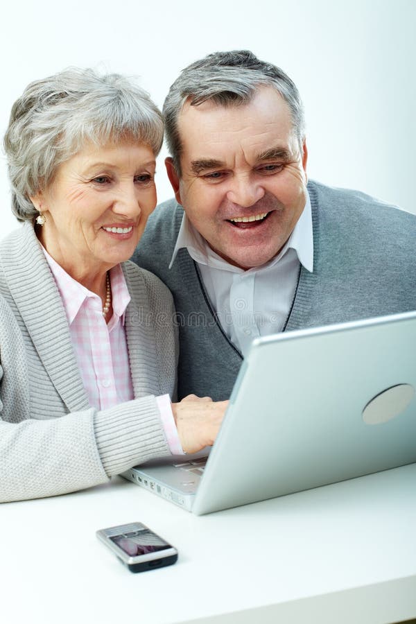 Seniors Enjoy Computer stock image. Image of male, intelligent - 5033433