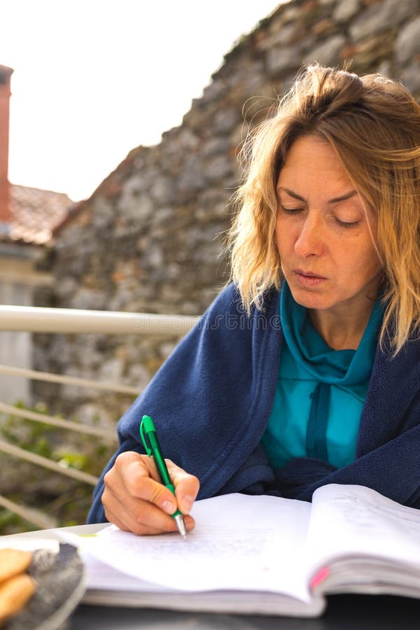 Education for Adults, Woman Writes in a Notebook Stock Image - Image of ...