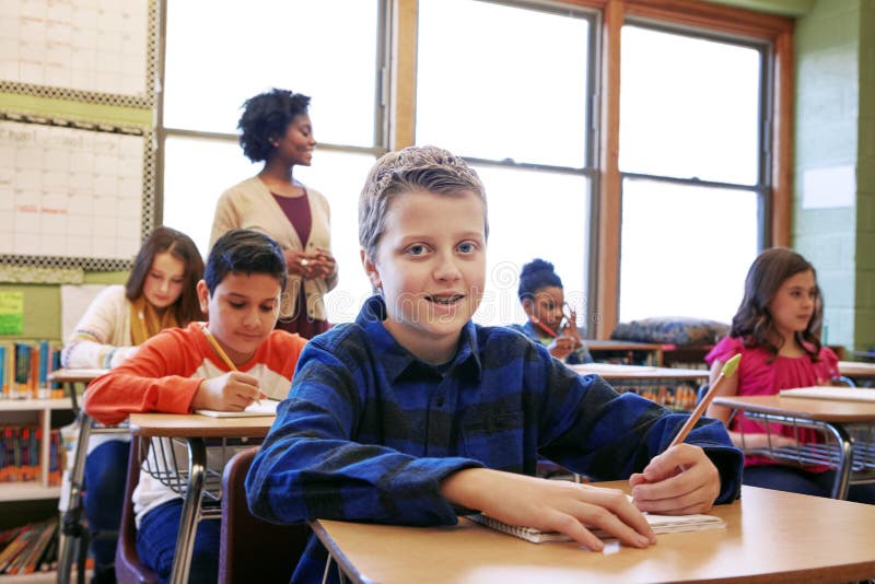 Education, Boy and Student Portrait in Classroom with Notebook for ...