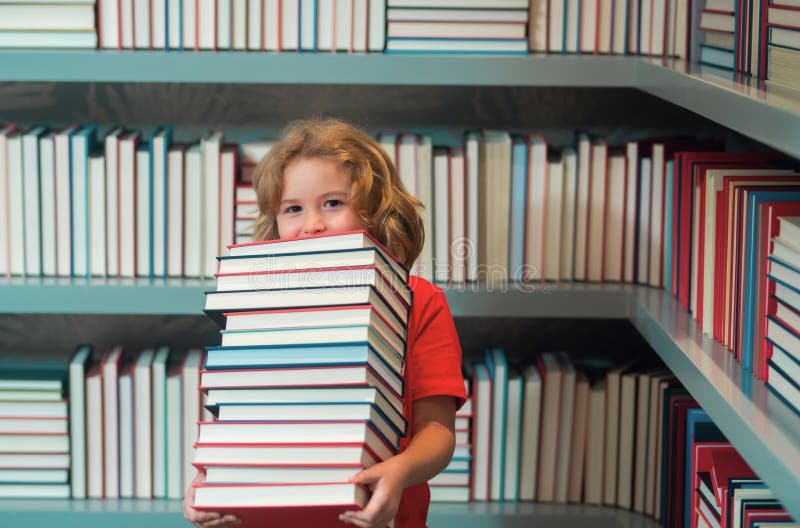 Education Concept. Child Pupil Reading Book in a Book Store or School ...