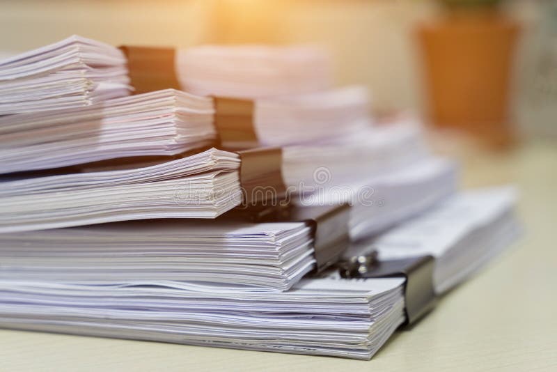 Stack of White Paperwork Achieves with Black Binder Paper Clips Stock ...