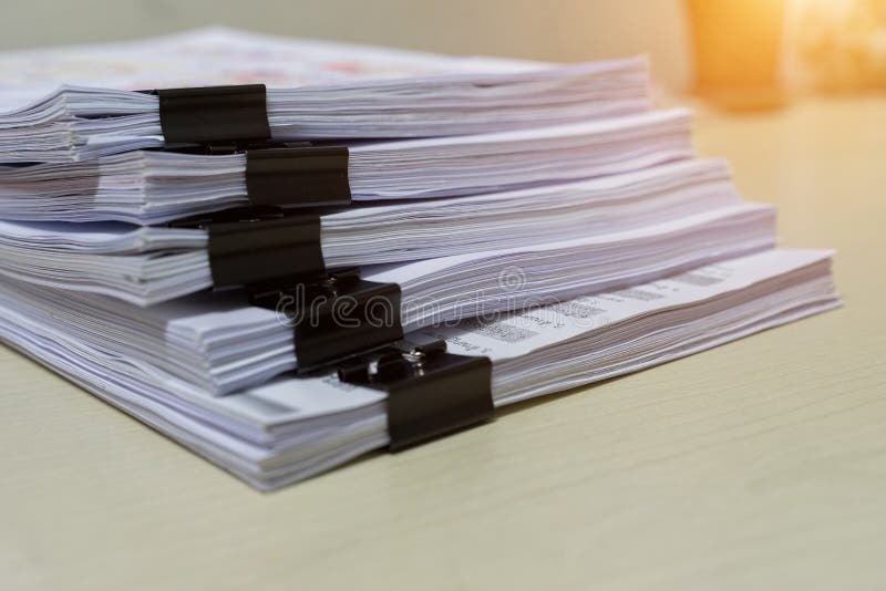 Stack of White Paperwork Achieves with Black Binder Paper Clips Stock ...
