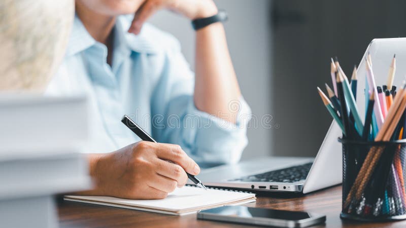 Education Concept. Close Up of Female Student Make Notes Hand Write in ...