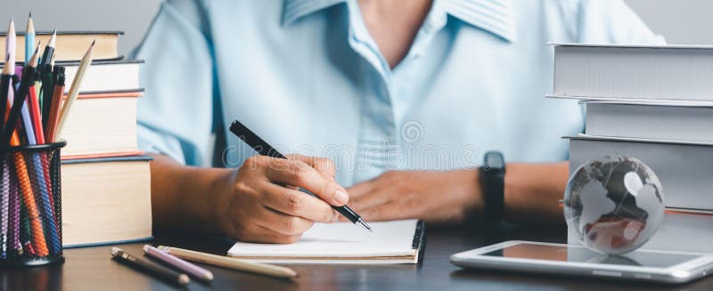 Education Concept. Close Up of Female Student Make Notes Hand Write in ...