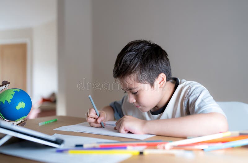 Education Concept,School Kid Using Grey Colour Pen Drawing or Sketching ...