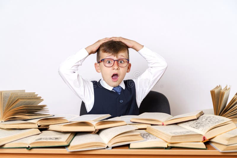 The Student Does His Homework, Holds His Head with His Hands, Yawns ...