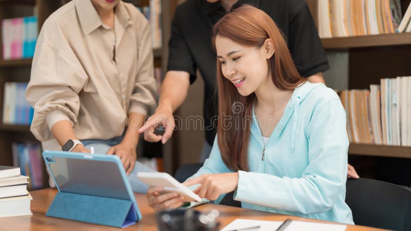 Education Concept, Students Pointing Quiz on Tablet and Use Calculator ...