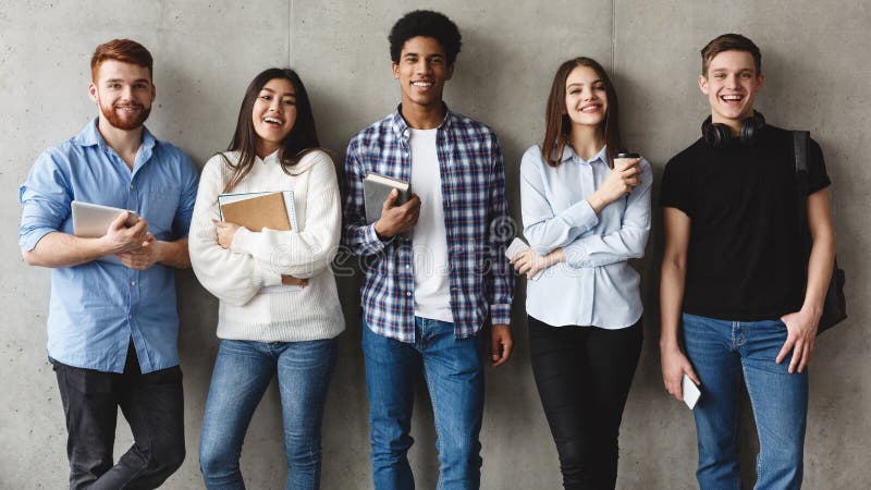 Education Concept. Students Smiling To Camera Over Grey Wall Stock ...