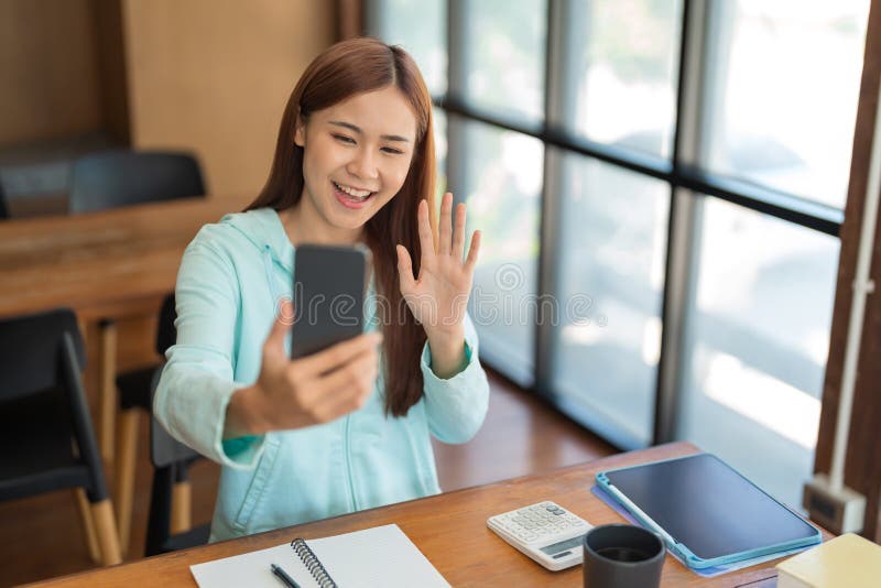 Education Concept, Teenage Girl Using Smartphone To Video Call with ...