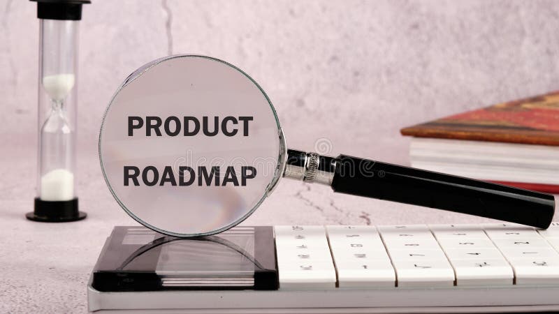 Education Concept. Text PRODUCT ROADMAP through a Magnifying Glass on a ...