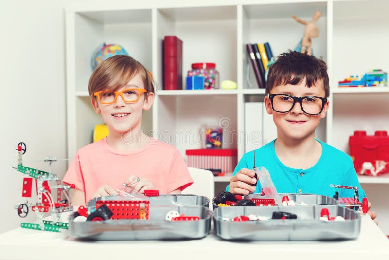 Education, Engineering and Hobby Concept. Funny Classmates Doing ...