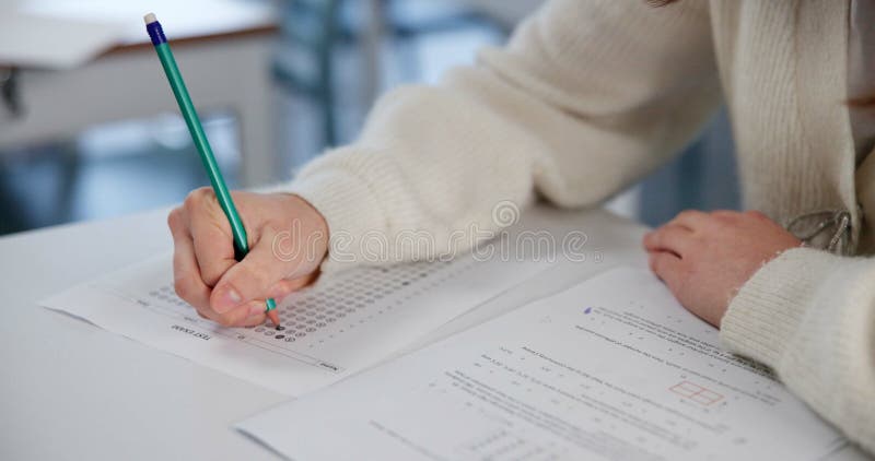 Education, Exam and Hands with Test Paper at Desk and Multiple Choice ...