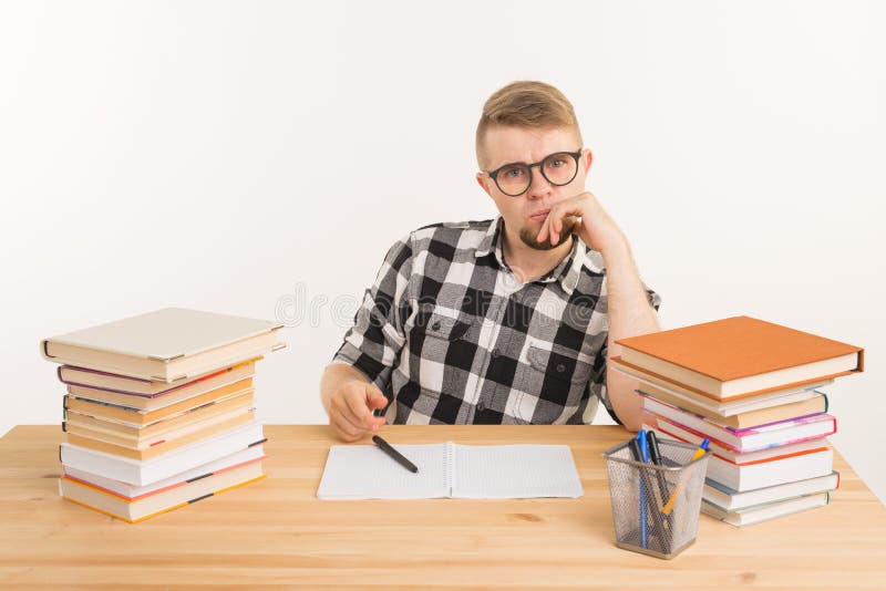 Education, Knowledge and People Concept - Student in Glasses Thinking ...