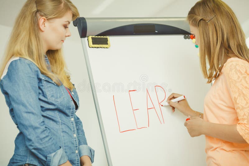 Student Girls Writting Learning Word on Whiteboard Stock Photo - Image ...