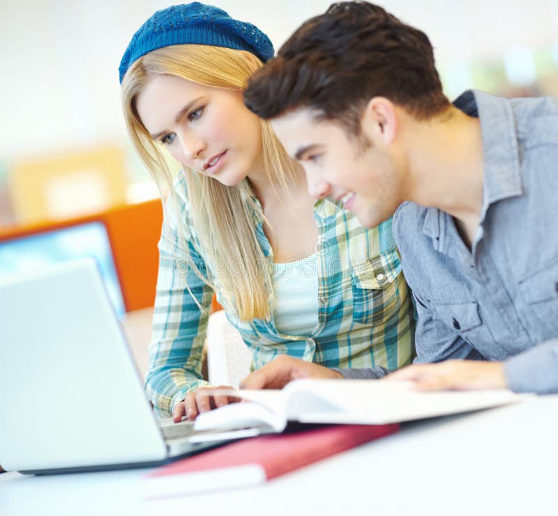 Education, Laptop and Notebook with Student Friends in Library at ...