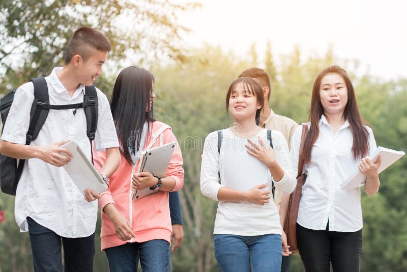 Education Learning Concept: Confident Asian Students Groups Walking ...