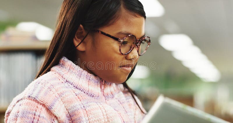 Education, Learning and Kid Reading Book in Library for Skill ...