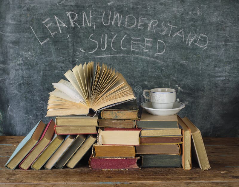 Education,learning,knowledge Concept,books and Blackboard with Slogan ...