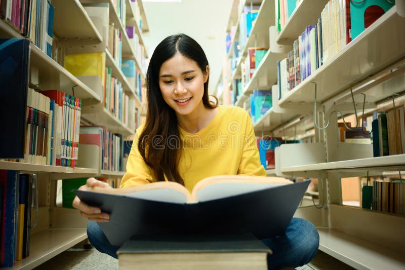 Education, Learning, Knowledge Concept. Smiling Female Student Sitting ...
