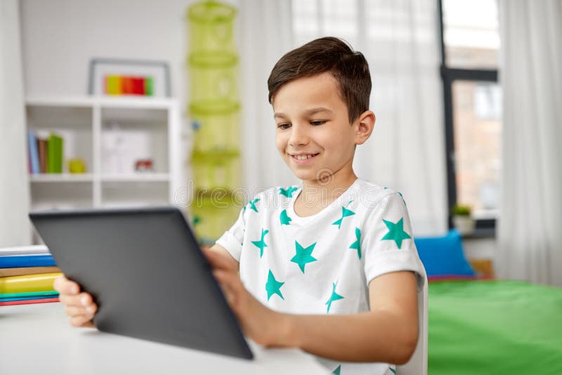 Student Boy with Tablet Pc and Notebook at Home Stock Photo - Image of ...