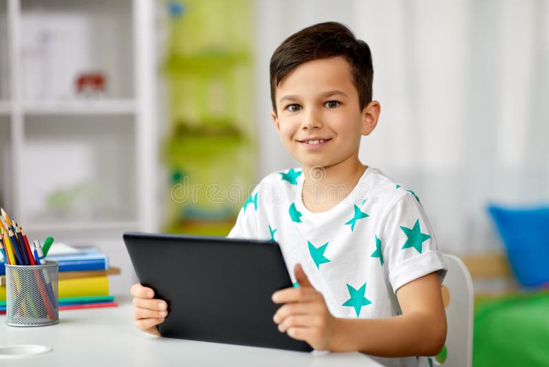 Student Boy with Tablet Pc and Notebook at Home Stock Photo - Image of ...